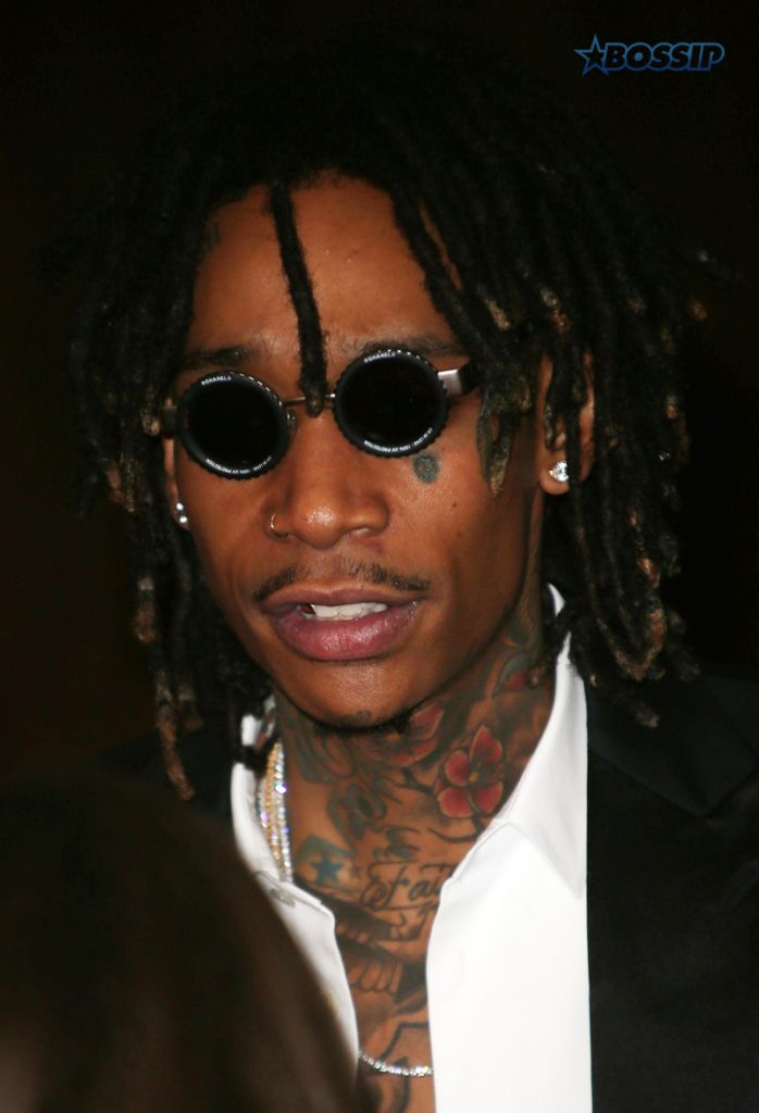 14 Pics Of Rappers In Women's Clothing