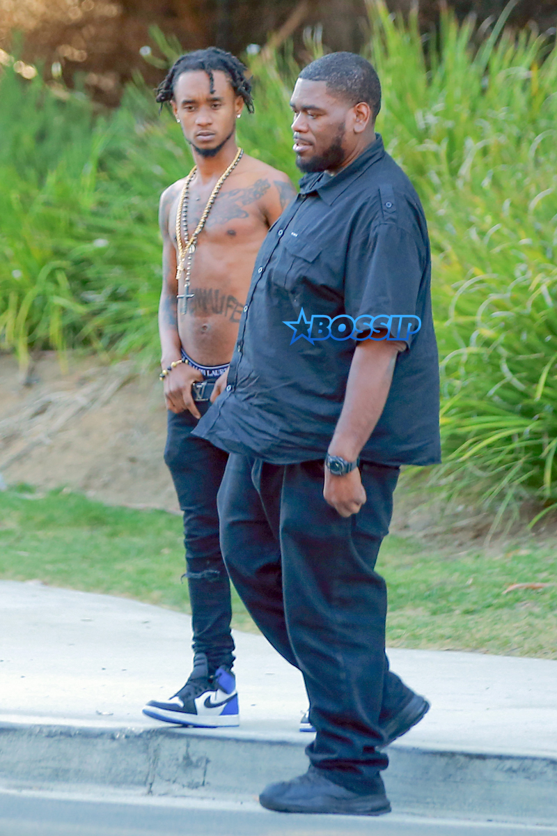 Guess The Rapper Peeing On The Side Of The Road