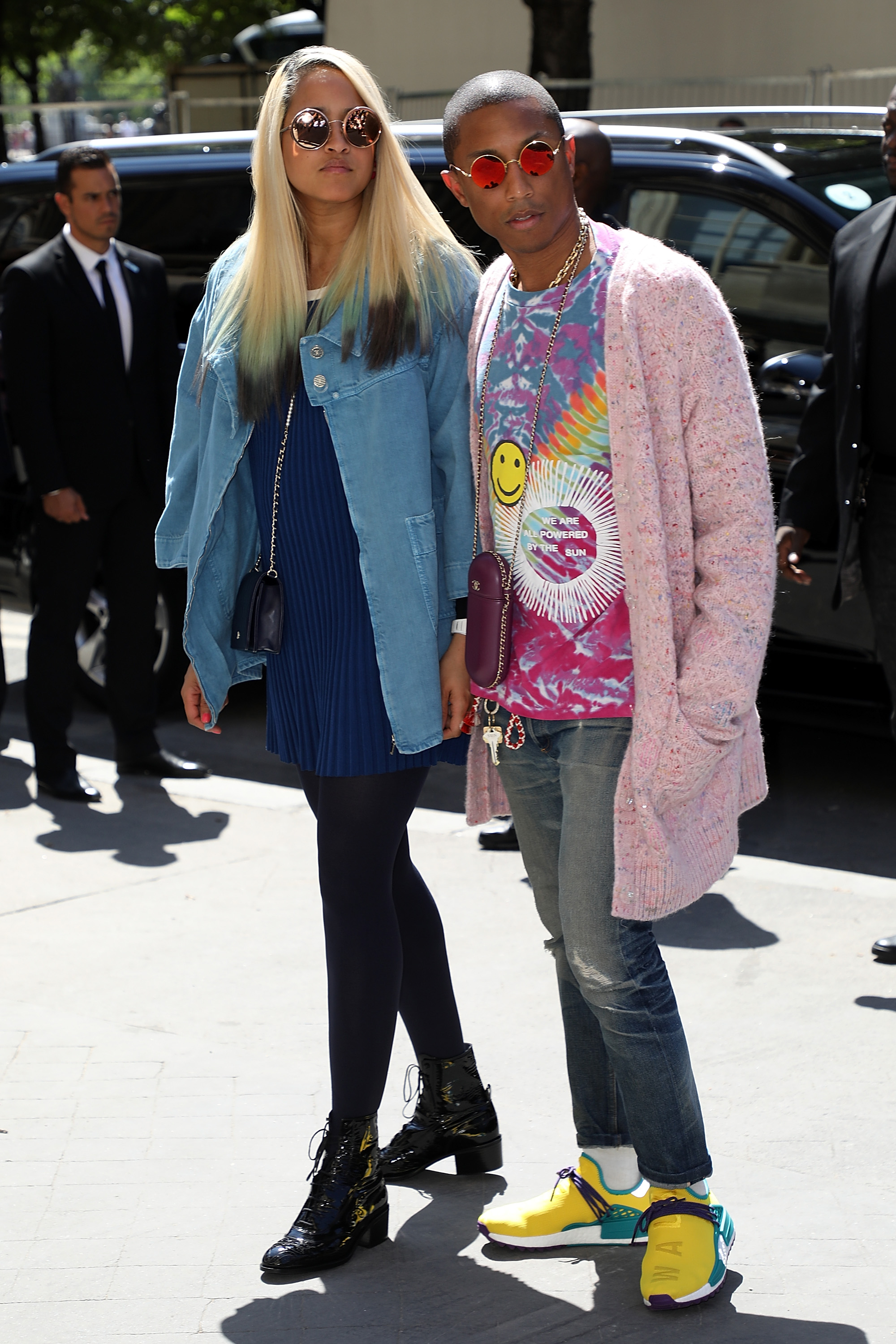 Paris Fashion Week: Pharrell & Wife Helen Rock Matching Chanel Purses