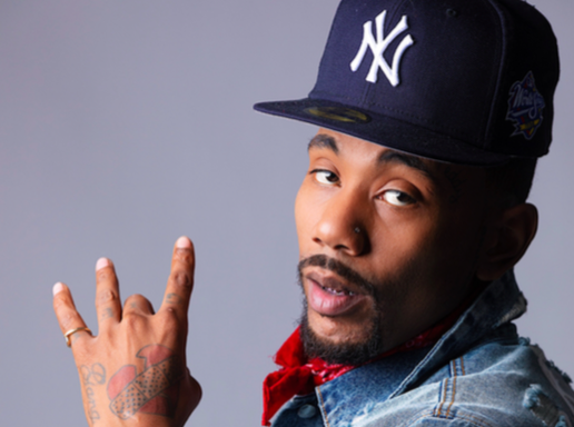 Nizzle Man Is Surrounded By Baddies & Bands In "Heading To The Bank" Video