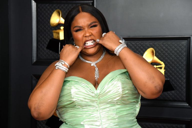 Lizzo Poses In A Tiny Tiger-Print Bikini While Celebrating Her Birthday