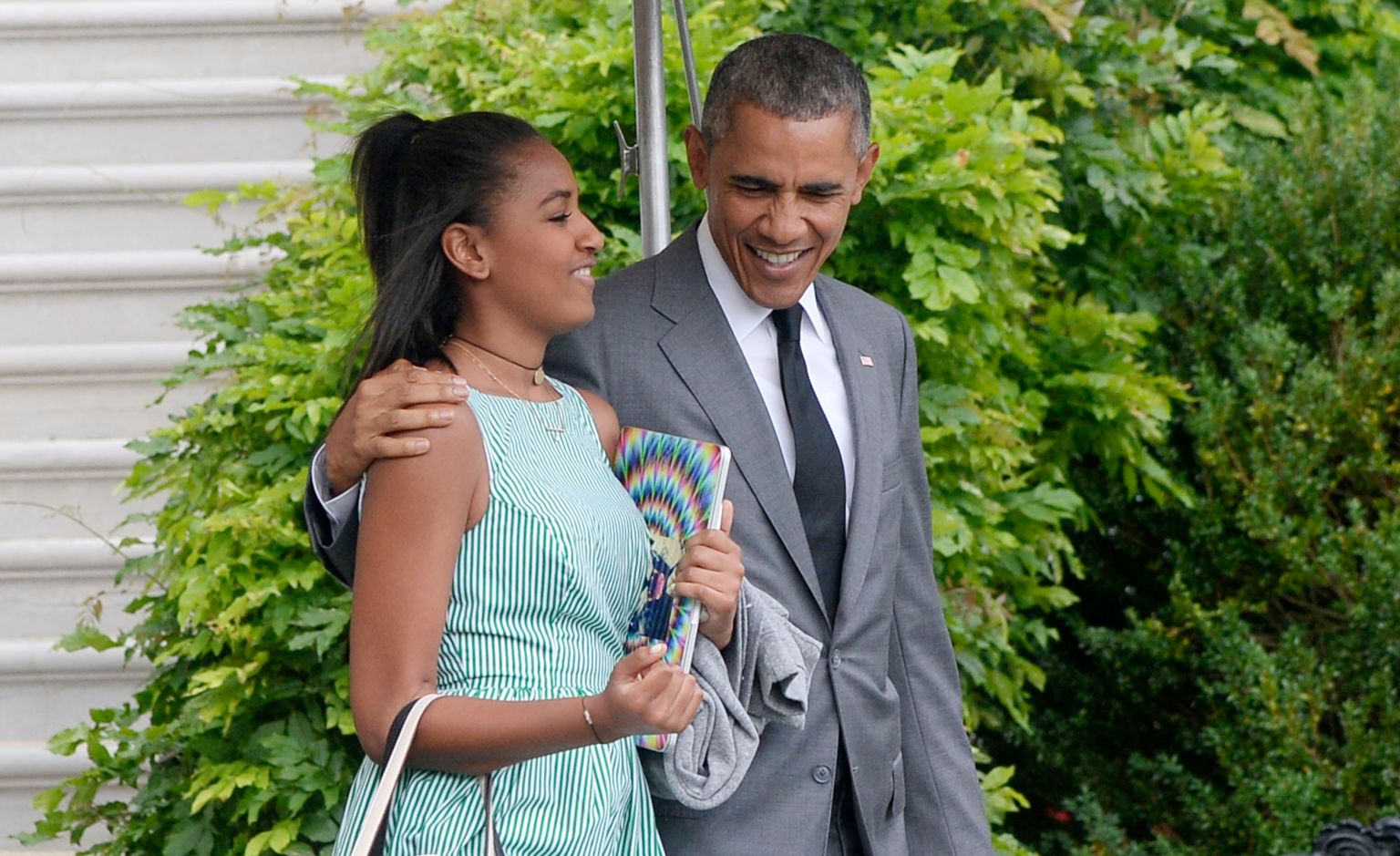 Barack & Michelle Obama Attend Sasha Obama's USC Graduation